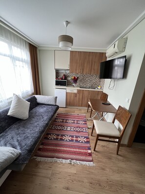Apartamento superior | Frigobar, cofres nos quartos, escrivaninha, quartos à prova de som