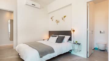 Apartamento, 2 camas queen-size, não fumadores | 2 quartos, ferro/tábua de engomar, berços/camas para crianças