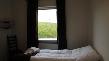 Cortinas/cortinados opacos, camas desdobráveis, Wi-fi grátis