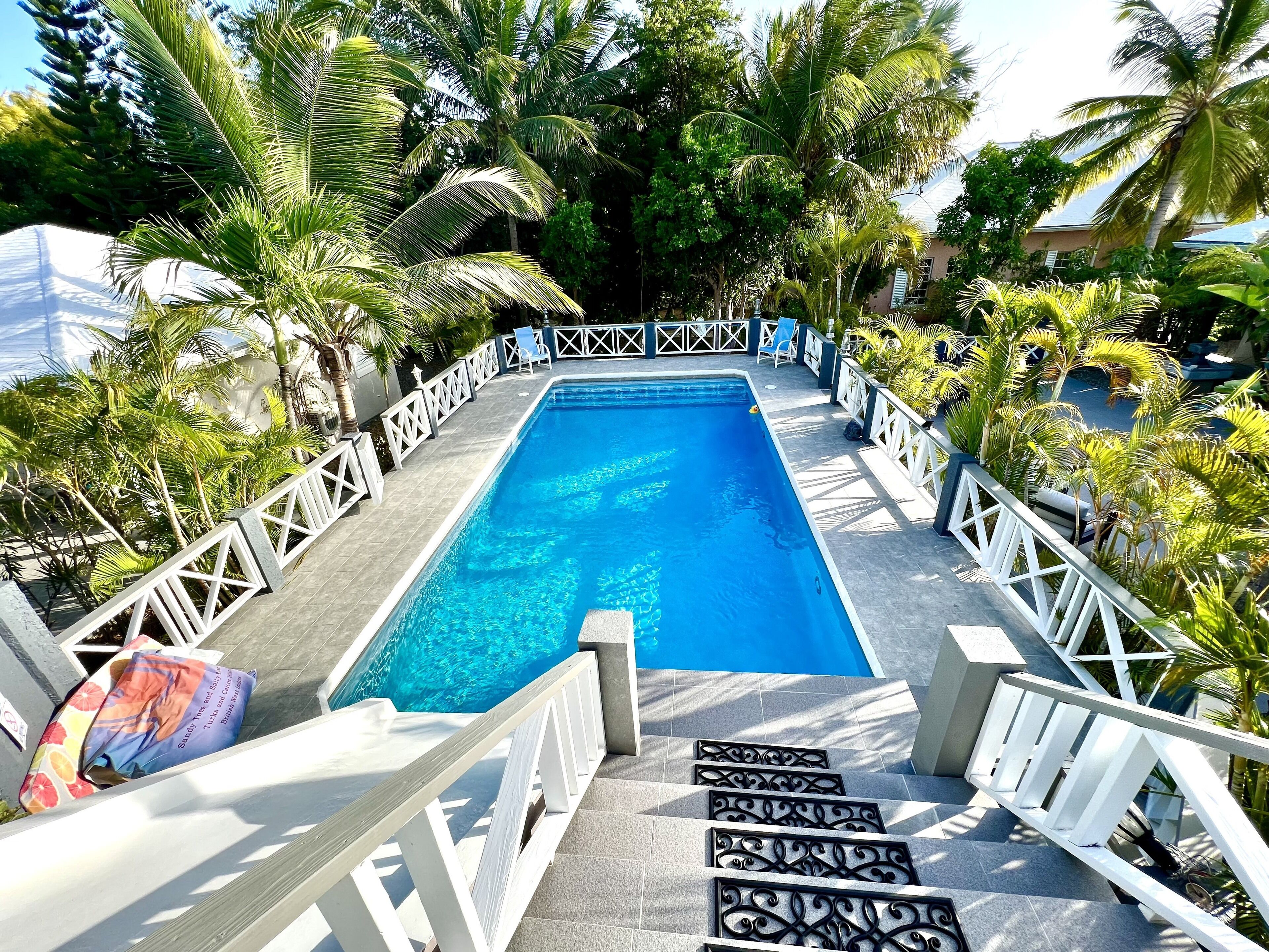Beach and Silly Cay Inlet face the tranquil waters of the Caribbean Sea ...