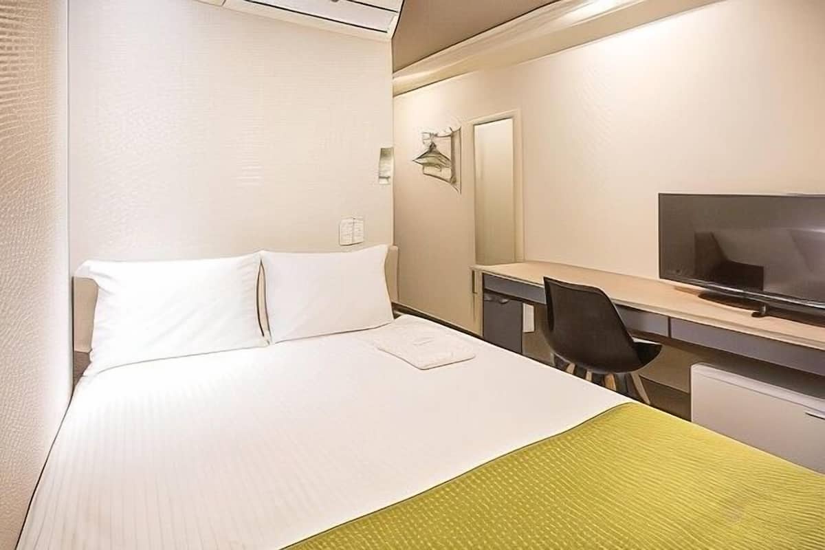 Quartos à prova de som, Wi-Fi de cortesia, roupa de cama
