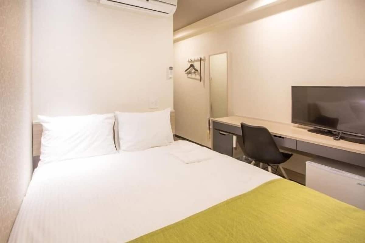 Quartos à prova de som, Wi-Fi de cortesia, roupa de cama