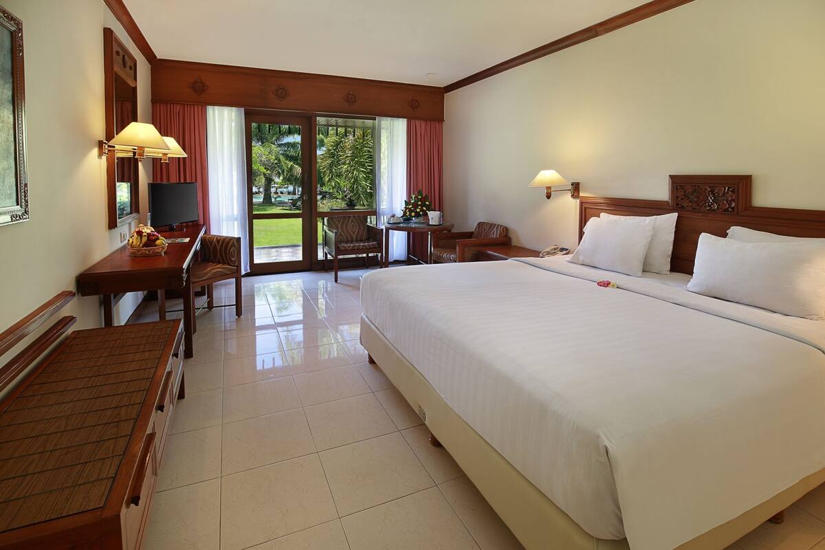 Quarto Deluxe, vista para o jardim | Comodidade do quarto