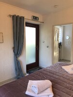 Apartamento Comfort | 1 quarto, com mobília individualizada, cortinas/cortinados opacos 