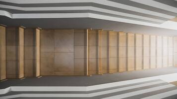 Interior moderno com um corredor comprido e estreito, piso estampado e uma série de armários de madeira.