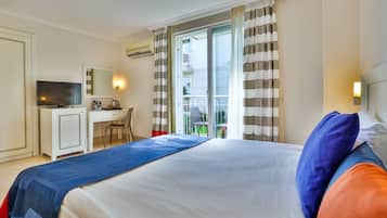 Quarto standard | Roupas de cama premium, frigobar (abastecido com itens grátis)
