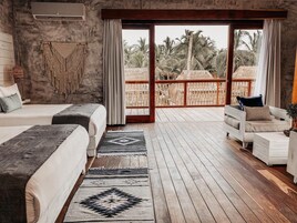 Quarto premium, 2 camas de casal, terraço, vista parcial para o oceano | Área de estar