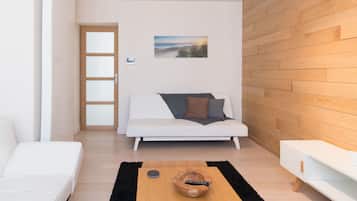 Apartamento conforto | Sala de estar | TV de tela plana