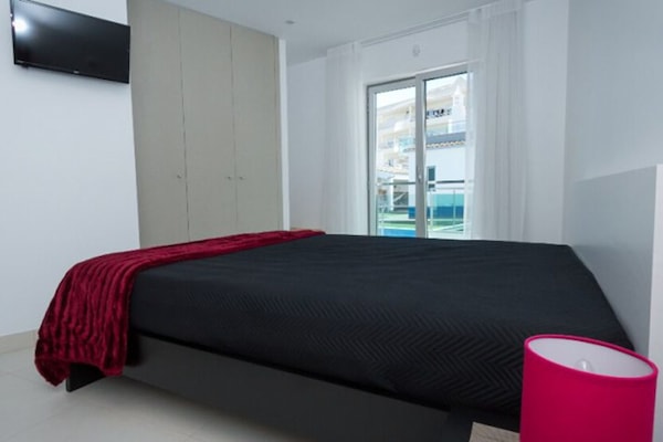 Apartamento, 3 quartos | Cortinas blackout, ferros/tábuas de passar roupa, roupa de cama