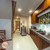 Quarto Duplo Deluxe | Cozinha privada