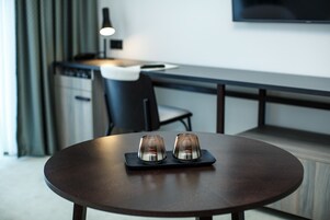 Suite Júnior | Sala de estar | TV plasma 