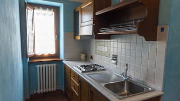 Apartamento, para não fumantes, vista para o jardim | Cozinha privada