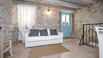 Apartment Mare groundfloor | Sala de estar | Televisor de ecrã plano de 60 cm com canais via satélite, televisor