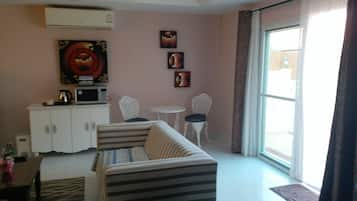 Suíte estúdio premium, 1 cama Queen, para não fumantes, vista para o jardim | Roupas de cama premium, cofres nos quartos, individualmente decorados