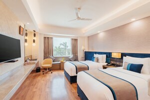 Quarto de Luxo | Minibar, cofre no quarto, com decoração personalizada 