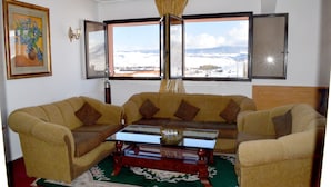 Suíte conforto | Sala de estar