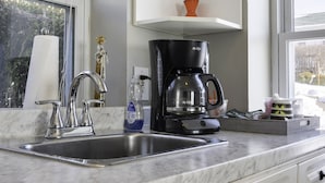 Quarto, várias camas | Cozinha privada
