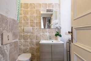 Apartamento, 1 quarto | 1 quarto, com decoração personalizada, com mobília individualizada 