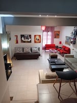 Dúplex Elite | Sala de estar | TV plasma 