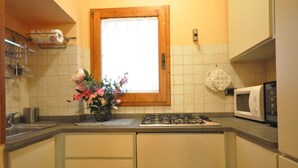 Apartamento, 2 quartos | Cozinha privada