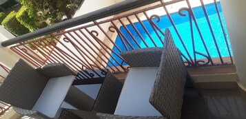 Quarto Júnior, vista para a piscina | Vista do quarto