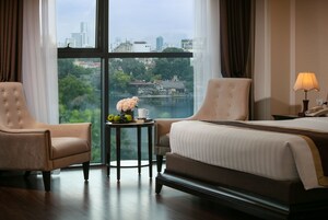 Suíte luxo, 1 cama King, vista para o lago | Vista do quarto
