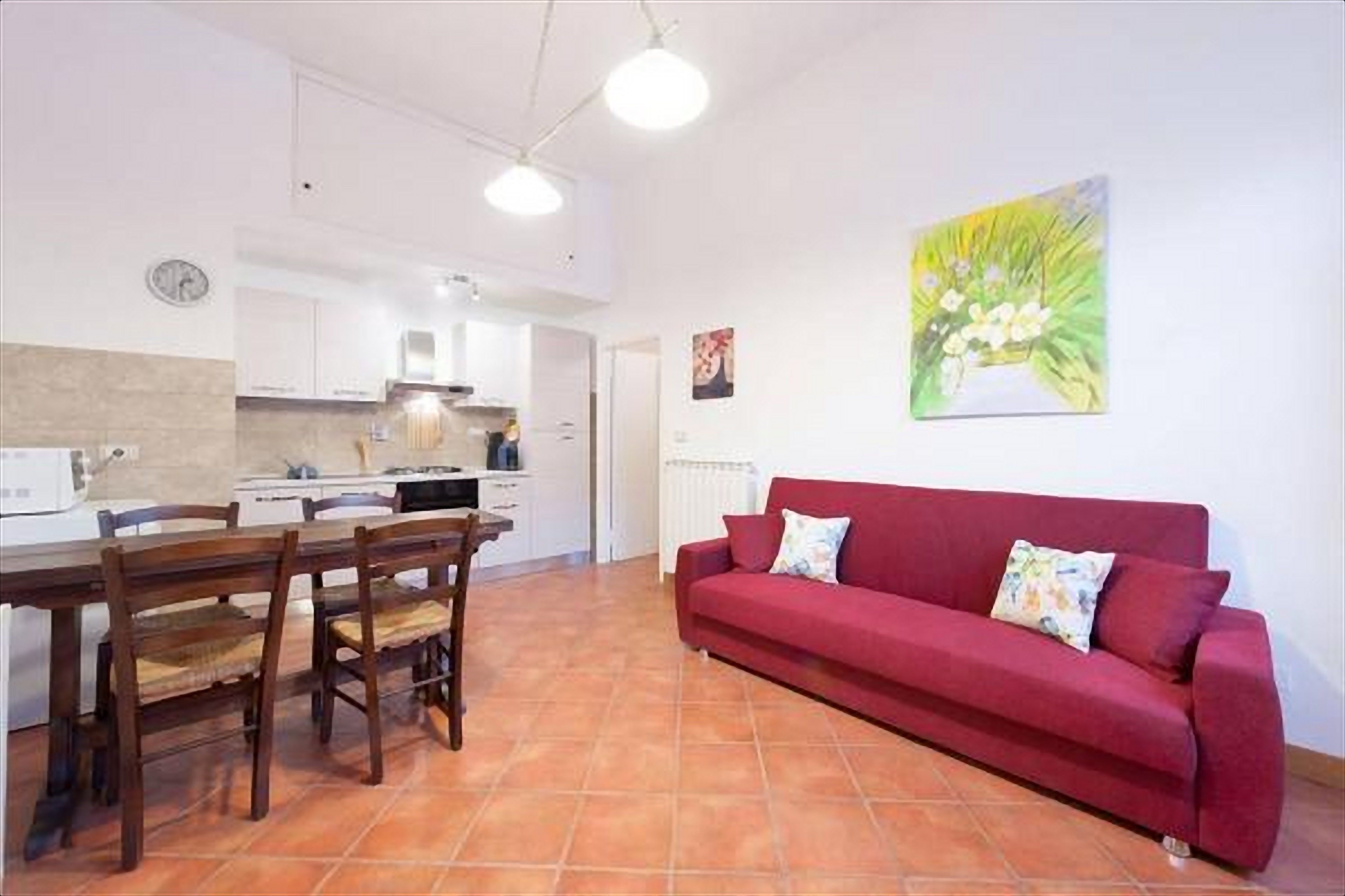 Apartamento, 1 quarto | Sala de estar | TV de ecrã plano 