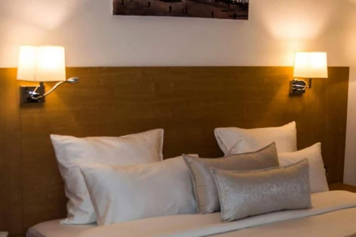 Suite Executiva | Minibar, Wi-fi grátis, roupa de cama fornecida