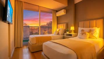 Apartamento família, 2 quartos | 1 quarto, roupas de cama premium, edredons de pluma