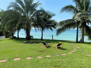 Na praia, toalhas de praia 