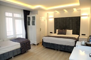 Quarto casal standard | Roupas de cama premium, frigobar (abastecido com alguns itens grátis)