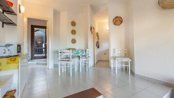 Villa, 2 quartos | Sala de estar | TV de ecrã plano