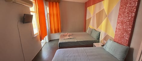 Quarto família, banheiro privativo | Wi-Fi de cortesia, roupa de cama