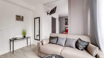 Suite Deluxe, 1 cama king-size, não fumadores | Sala de estar | TV de ecrã plano