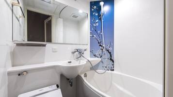 Quarto solteiro, para não fumantes | Banheiro | Chuveiro/banheira combinados, secador de cabelo, chinelos