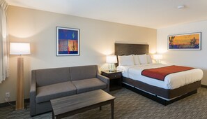 Quarto solteiro conforto, 1 cama King, para não fumantes | 1 quarto, camas com colchões pillow-top, cofres nos quartos