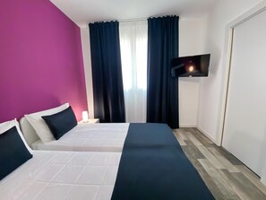 Quarto Básico (Montecarlo) | Minibar, secretária, Wi-fi grátis, roupa de cama fornecida 