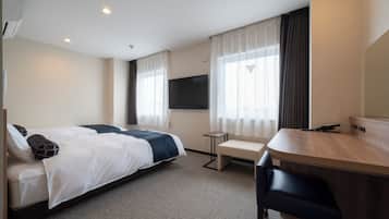 Quarto Twin Premium, não fumadores | Secretária, Wi-fi grátis, roupa de cama fornecida