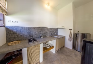 Vila, 1 quarto | Cozinha americana privada | Geladeira, cooktop, cadeirão de bebê