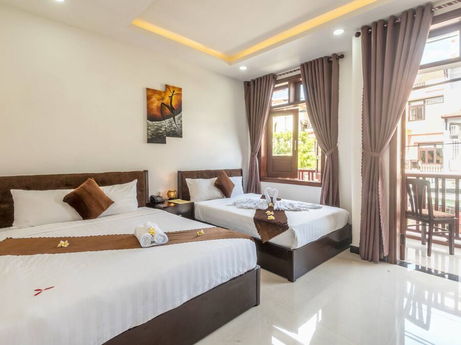 Quarto Deluxe | Minibar, secretária, Wi-fi grátis, roupa de cama fornecida