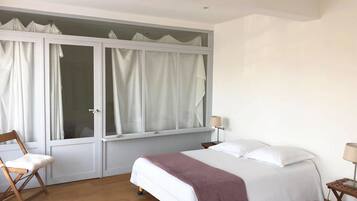 Suite Familiar | 1 quarto, cofre no quarto, Wi-fi grátis, roupa de cama fornecida