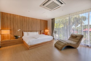 Quarto Deluxe | Minibar, cofre no quarto, com mobília individualizada, secretária 