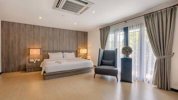 Quarto Deluxe | 1 quarto, minibar, cofre no quarto, com mobília individualizada