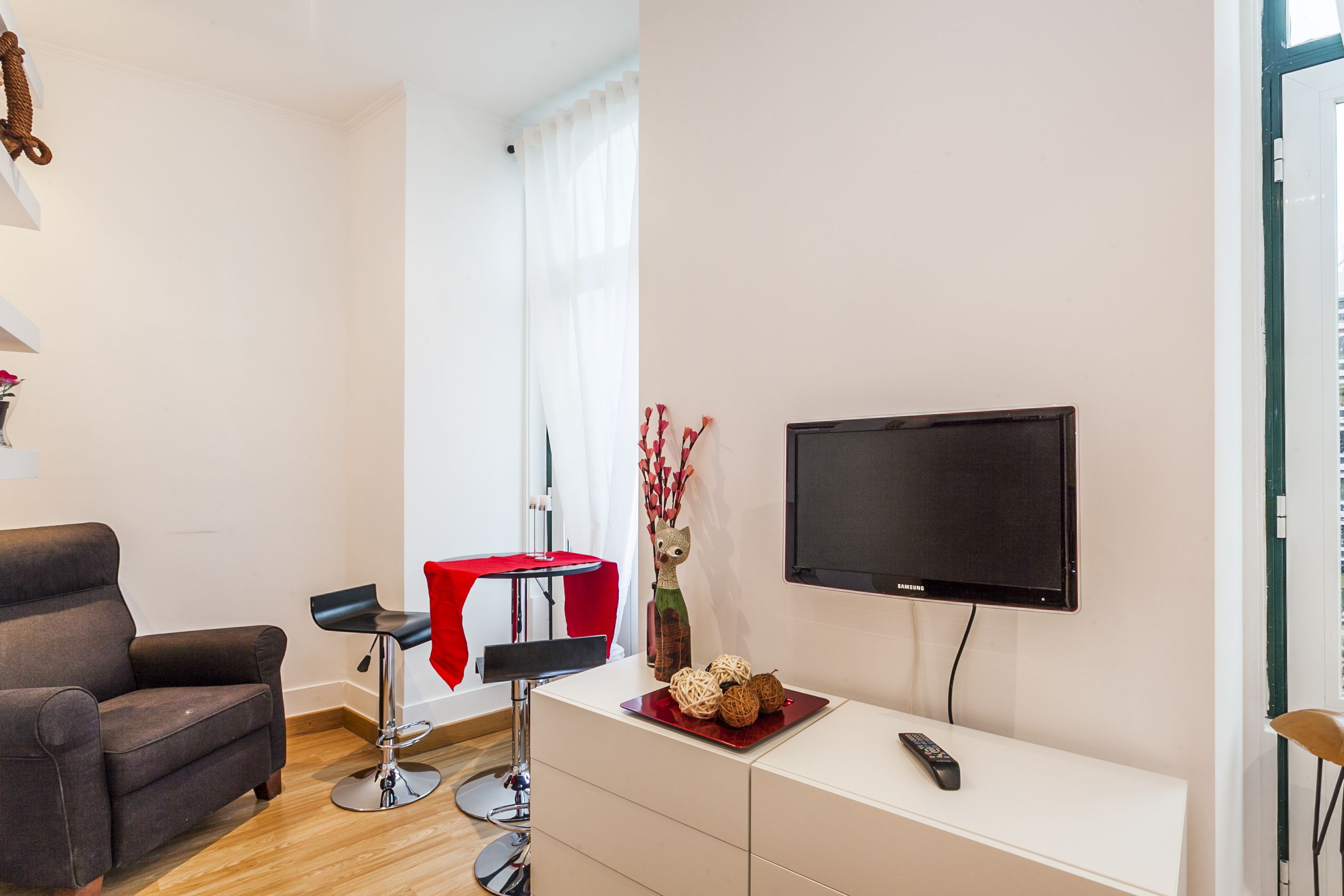 Apartamento, 1 quarto, varanda | Sala | Televisor LCD 