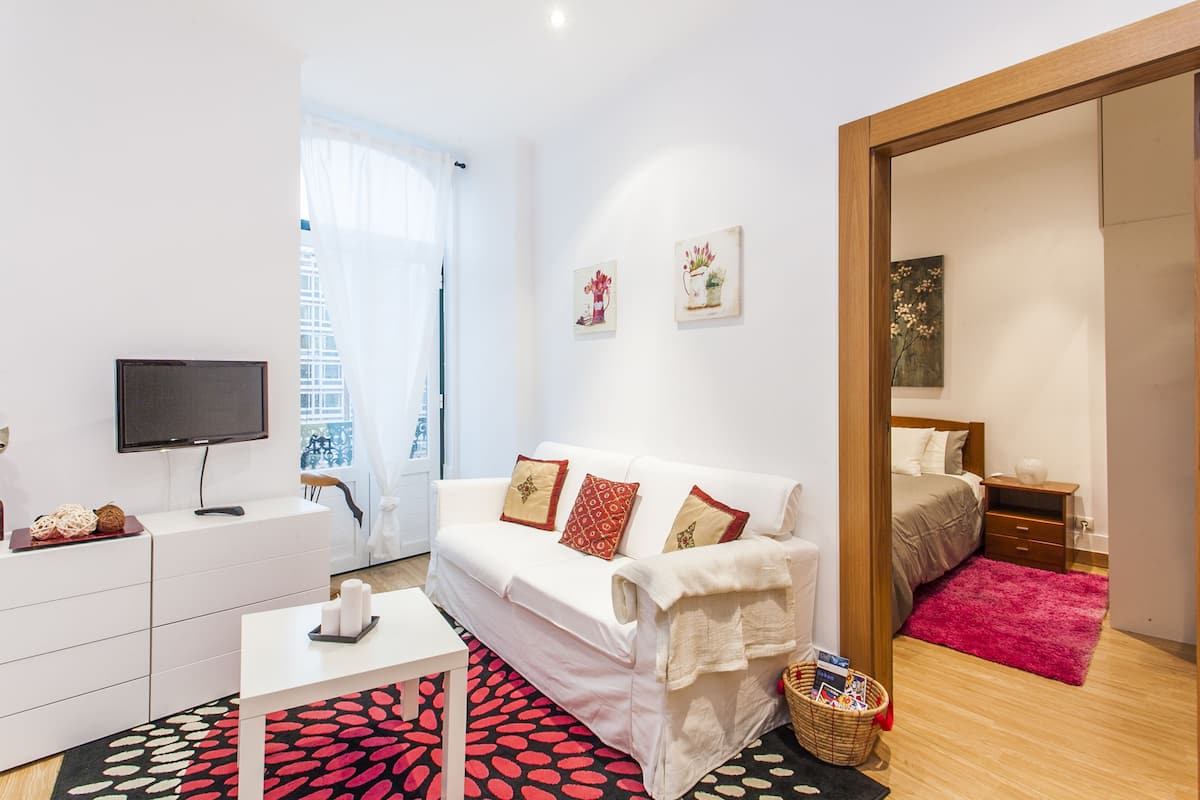 Apartamento, 1 quarto, varanda | Sala | Televisor LCD