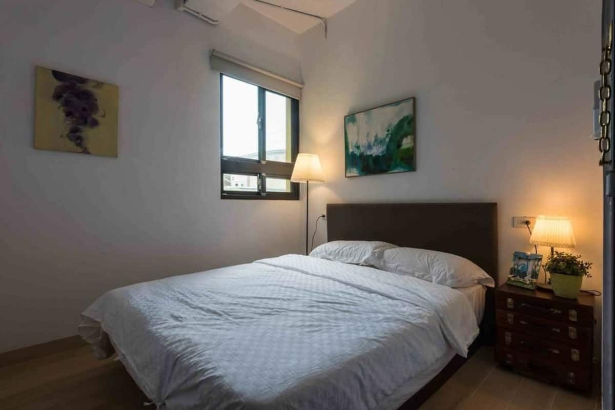Condo família, vista parcial para o oceano (2F) | 2 quartos, individualmente mobiliados, espaço de trabalho para notebook
