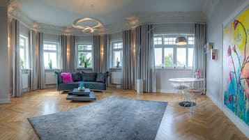 Apartamento luxo | Área de estar | TV de tela plana