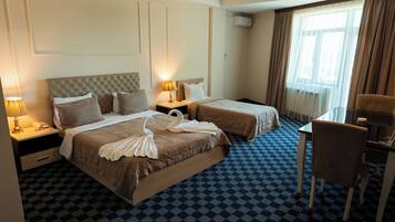 Quarto Triplo Deluxe, varanda | Vista da varanda