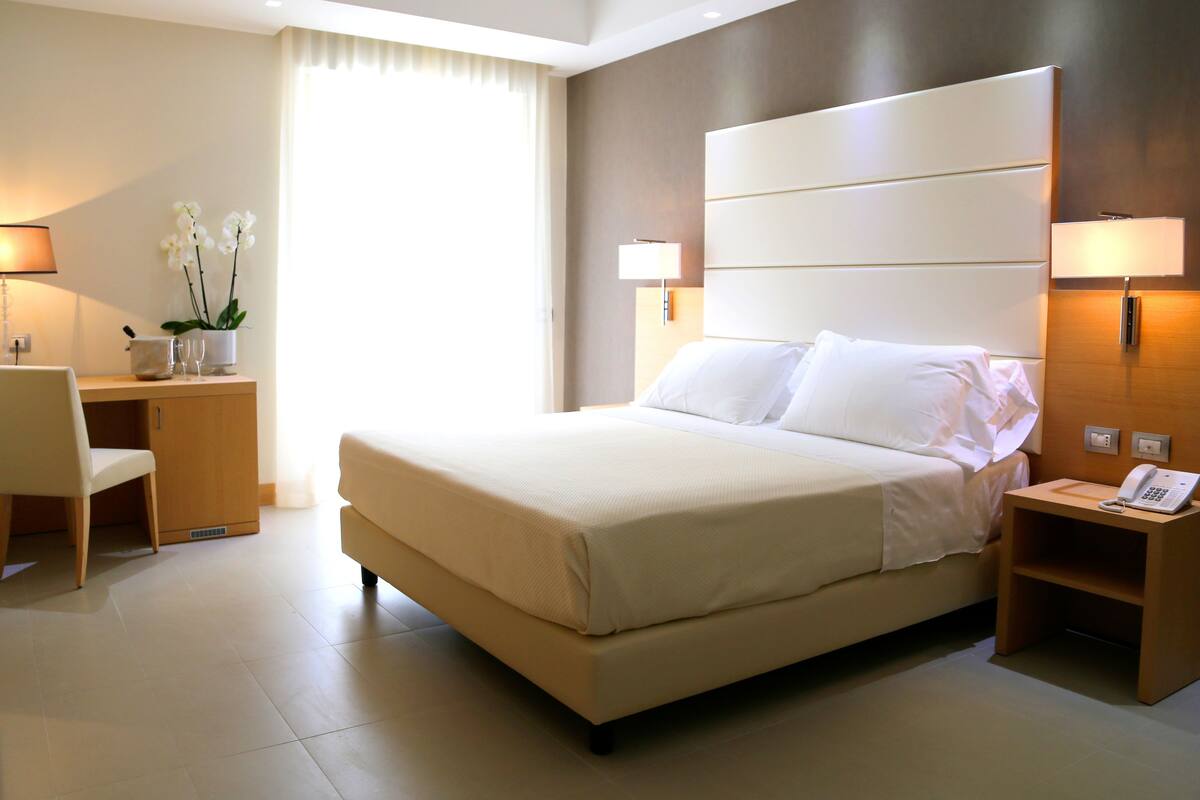 Quarto Deluxe | Minibar, cofre no quarto, secretária, berços/camas para crianças 
