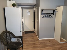 Apartamento (1 Bed) | Cortinas blackout, ferros/tábuas de passar roupa, Wi-Fi de cortesia